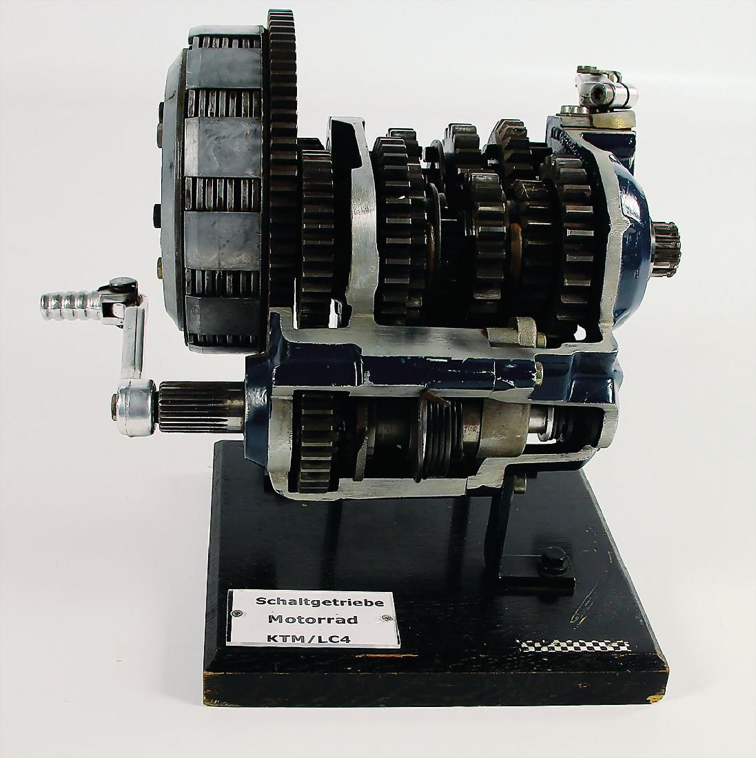 demonstration cutaway model of a motorbike control gear