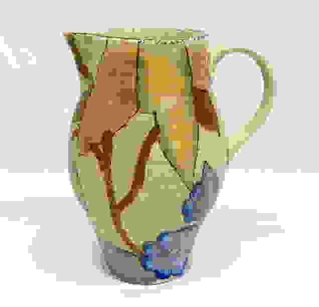 Pottery Pitcher/ Music Box In Base Auction