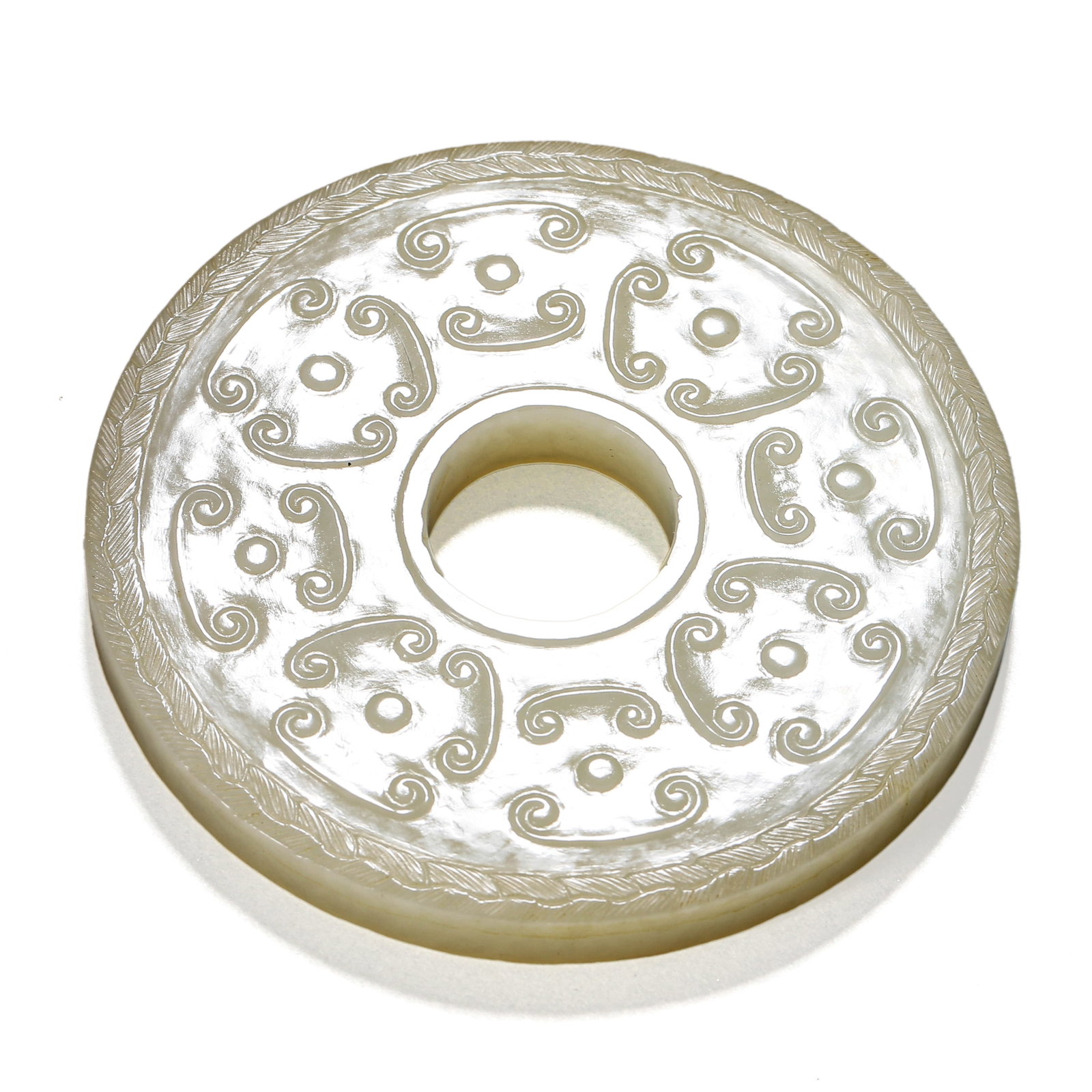 A Chinese White Jade Cloud Pattern Disc. - Jun 19, 2025 | Gerontius ...