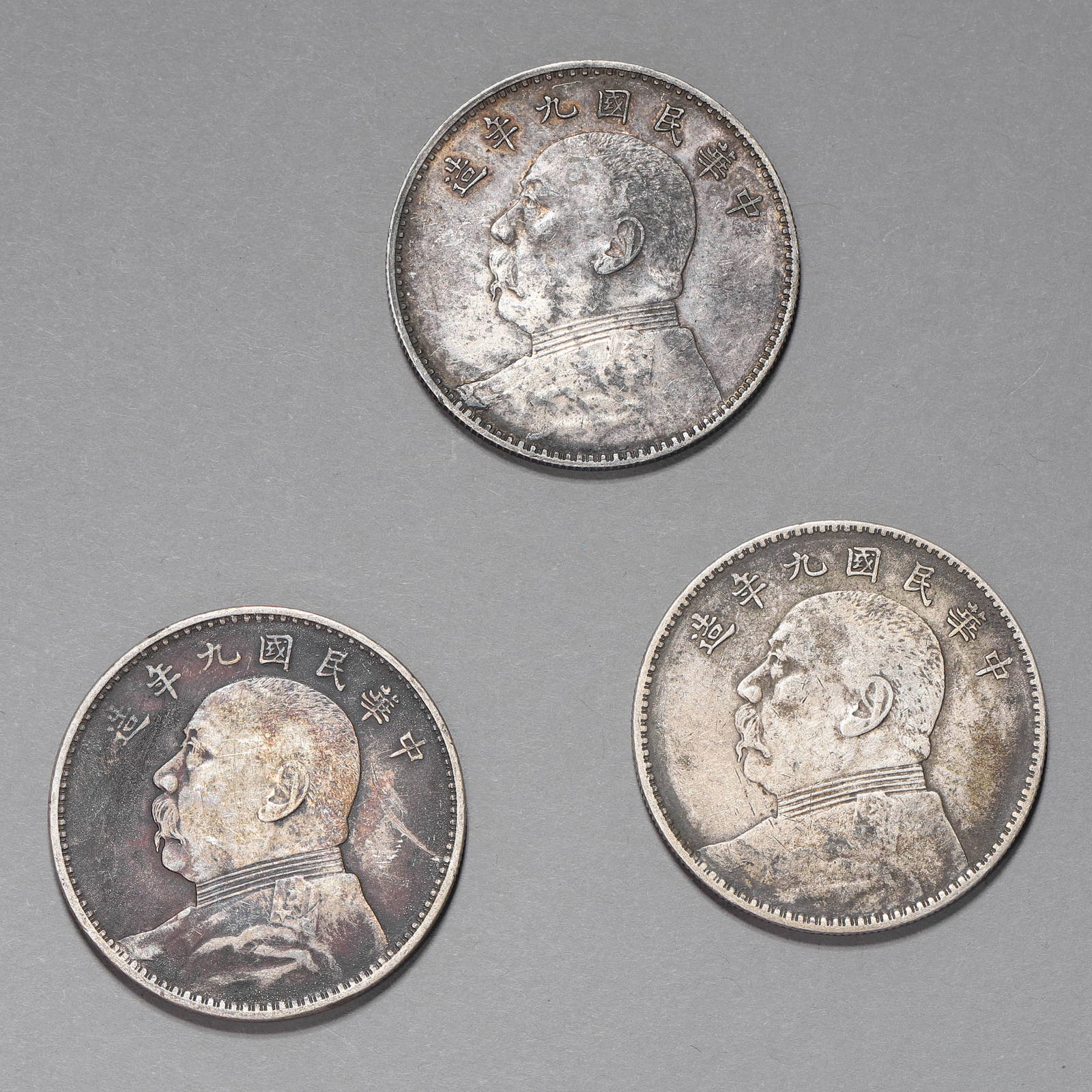 A Set Of Three Silver Coins Auction