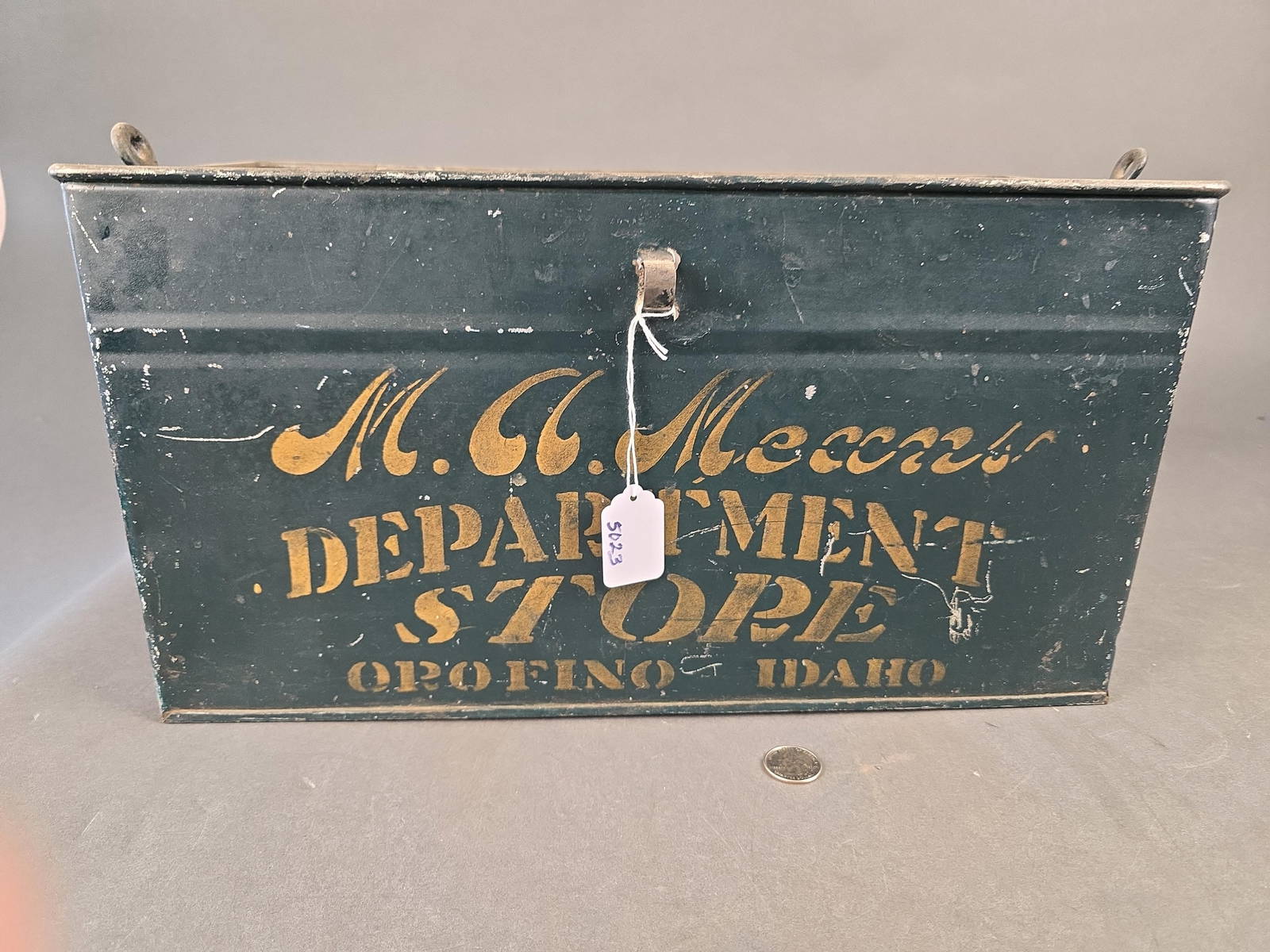 Advertisng Tin From Mark A. Means Dept Store Orofino Auction