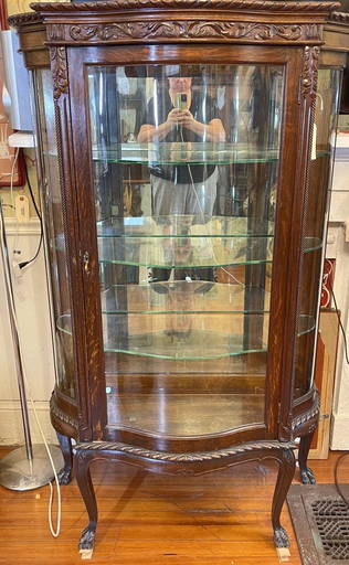 Turn Of The Century Carved Tiger Oak Serpentine Front Curio Cabinet