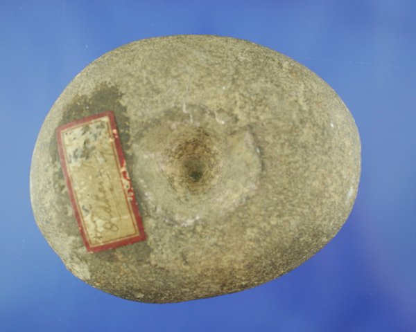 35: 4" Nutting Stone found in Oldham KY.
