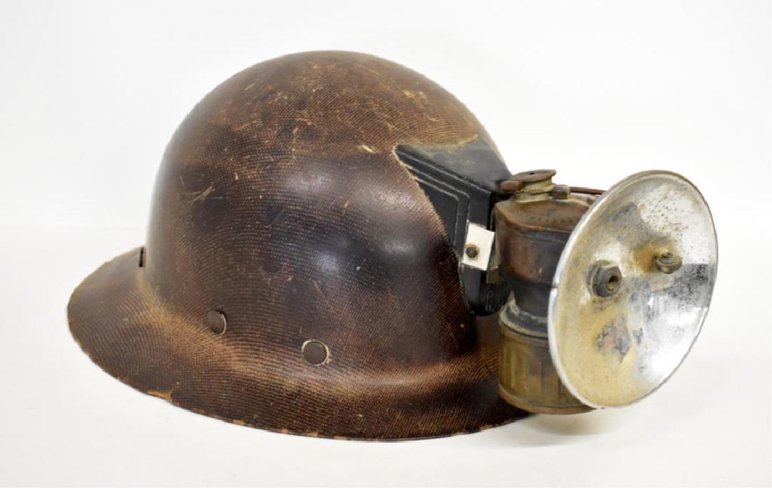 ANTIQUE MINER'S HELMET WITH HEADLAMP