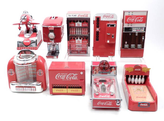Grouping Of Coca Cola Battery Operated Banks