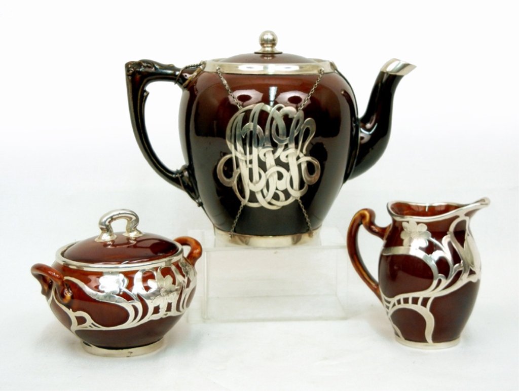 Lenox three piece silver overlay tea set, including tea