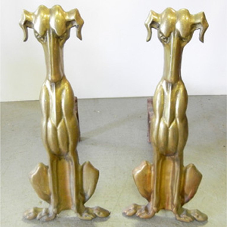Pair of brass seated dog andirons, marked Tenn Chrome P