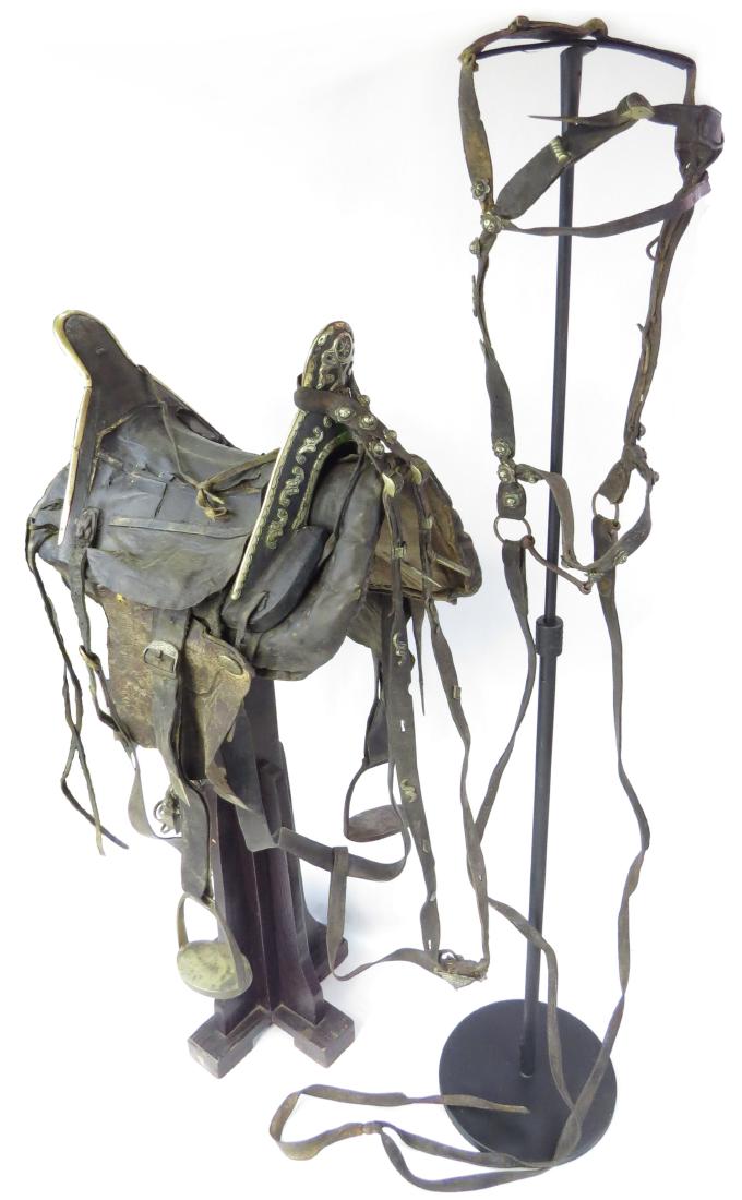 A RARE COSSACK SADDLE AND TRAPPINGS