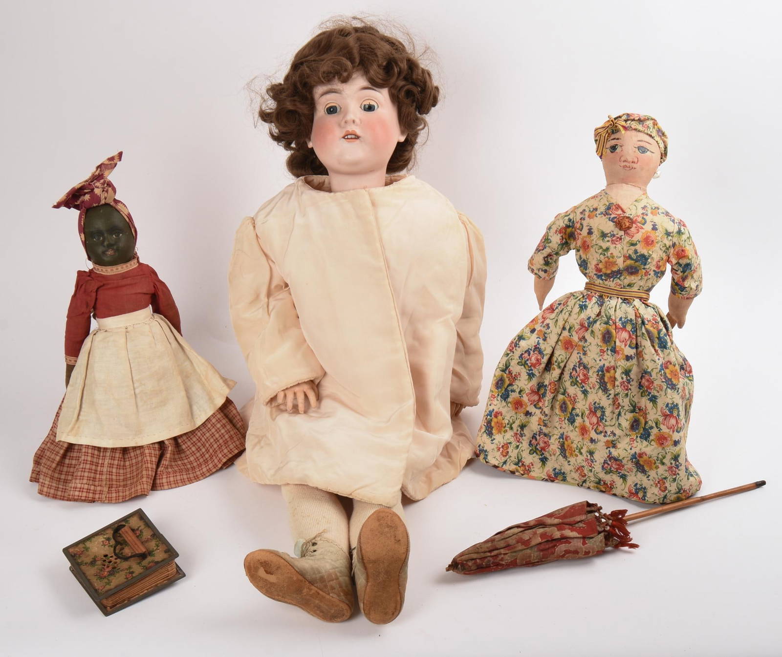 Three Dolls. Auction