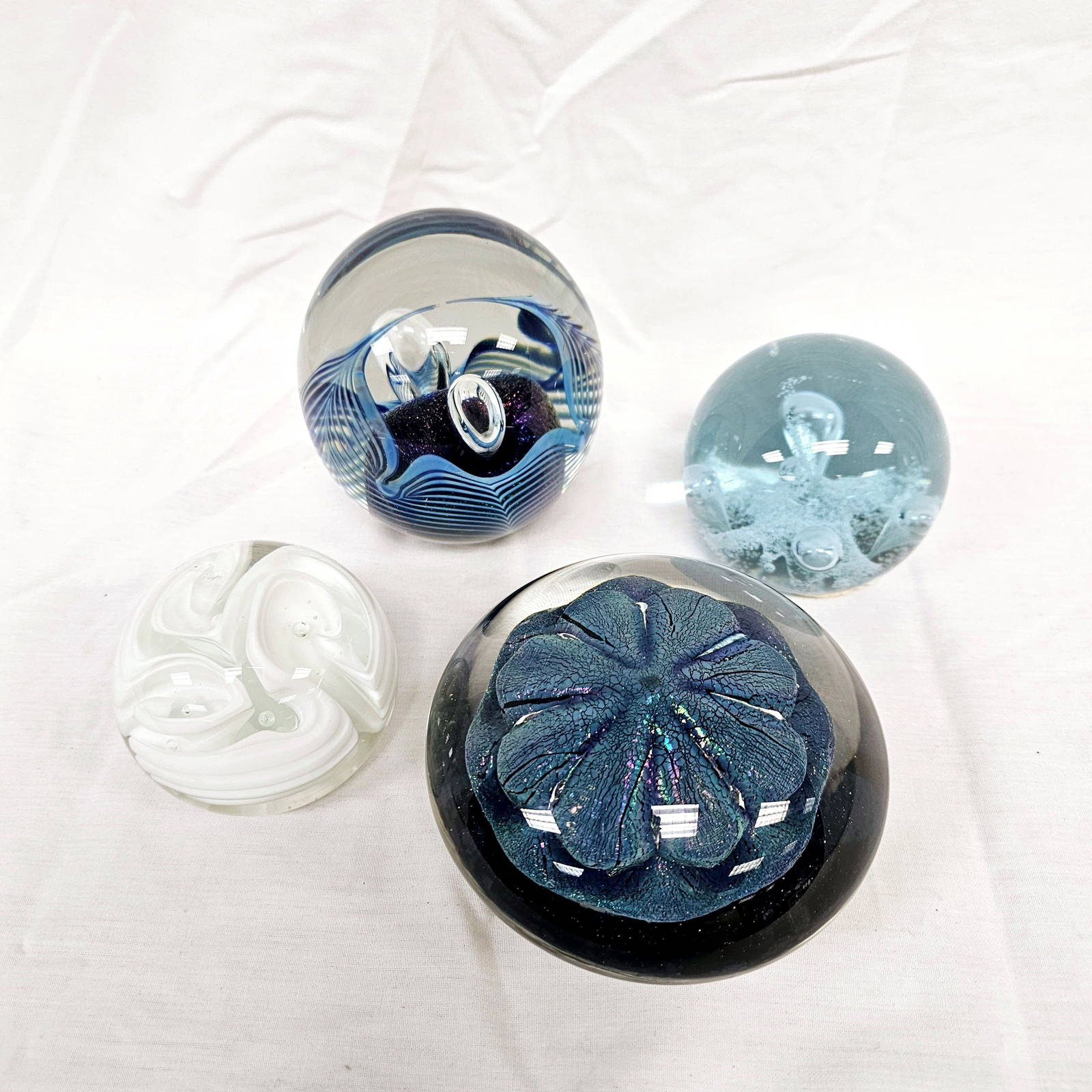 Group Of Four Art Glass Paperweights, Two Signed By Robert Eickholt Auction