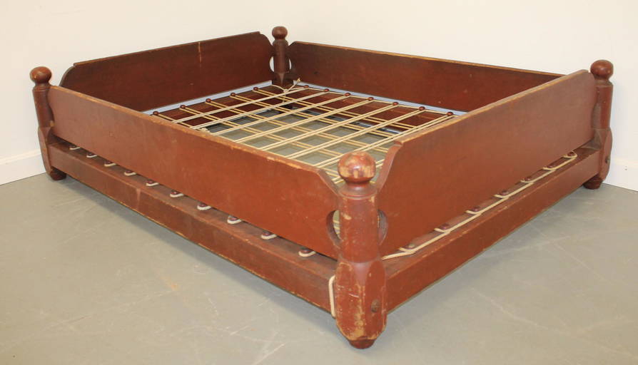 Contemporary antique style rope trundle bed in red paint - approx 59 ...