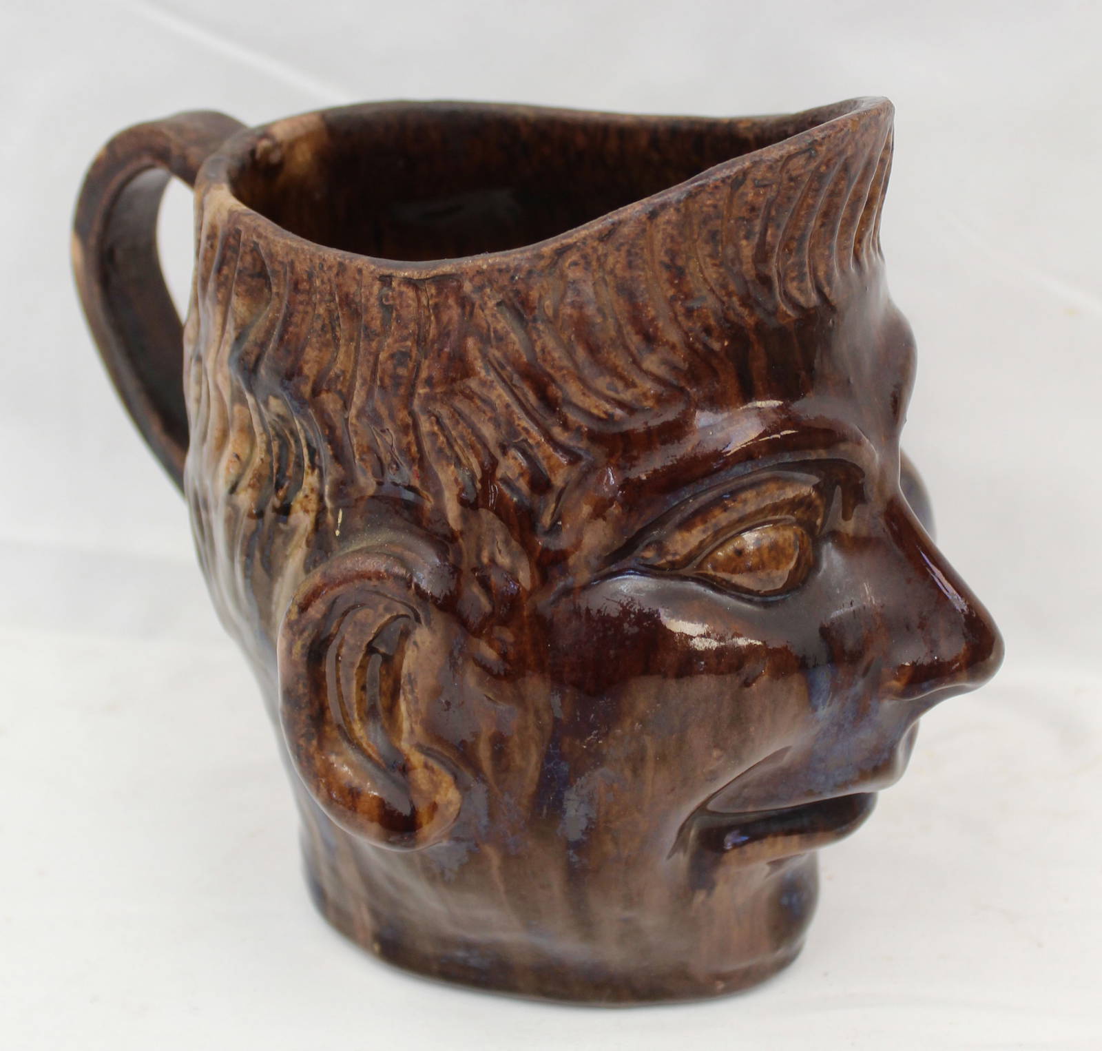 Bennington Face Pitcher - 7" Tall Auction
