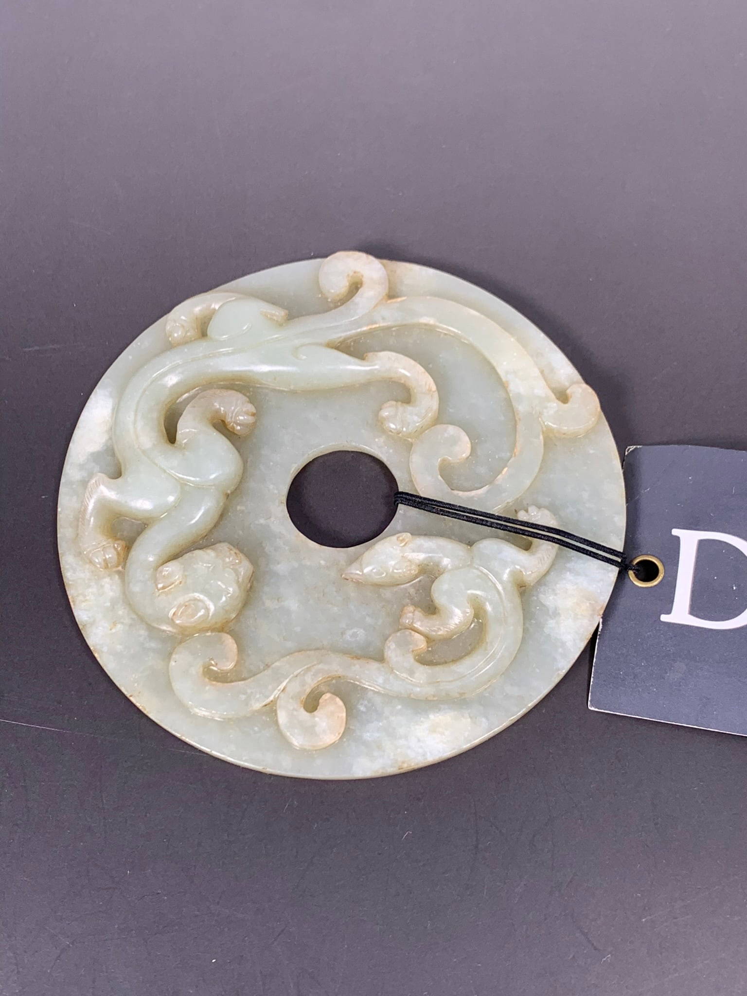 Doyle Provenance: A Chinese Carved White Jade Bi Disc, Ming Dynasty Auction