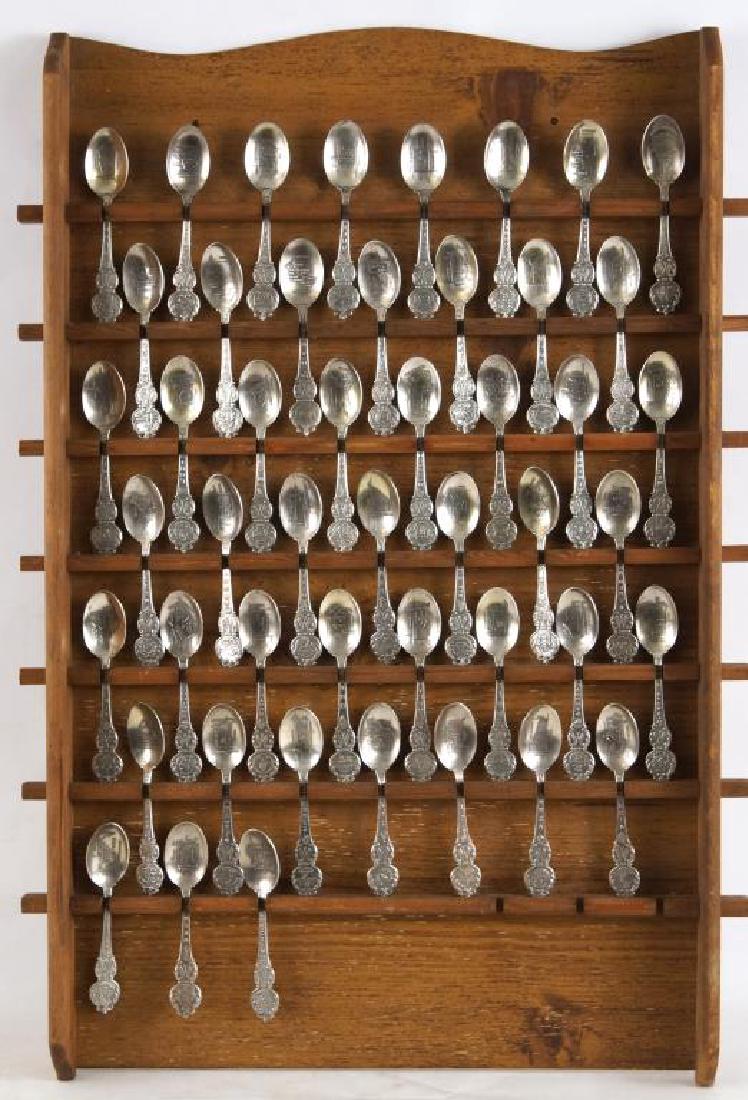 A Set Of American Collectors Guild State Spoons