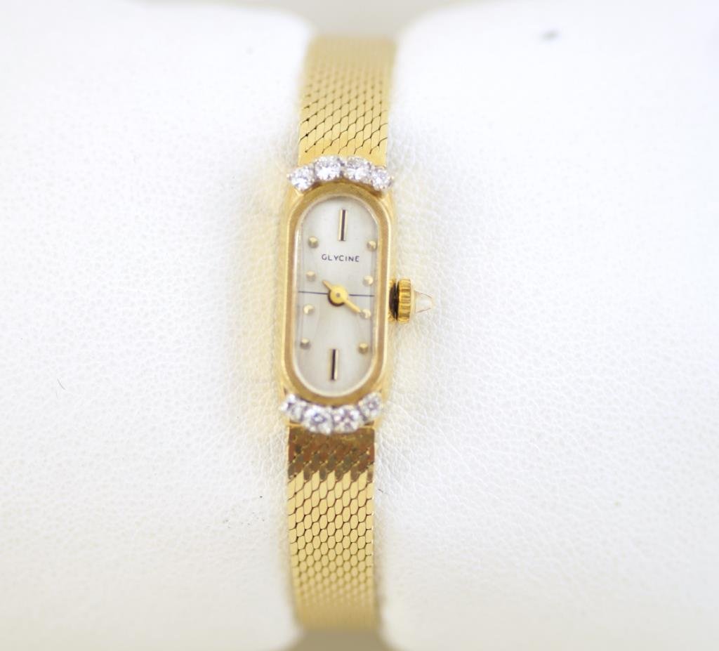 14kt Glycine ladies gold watch w diamonds