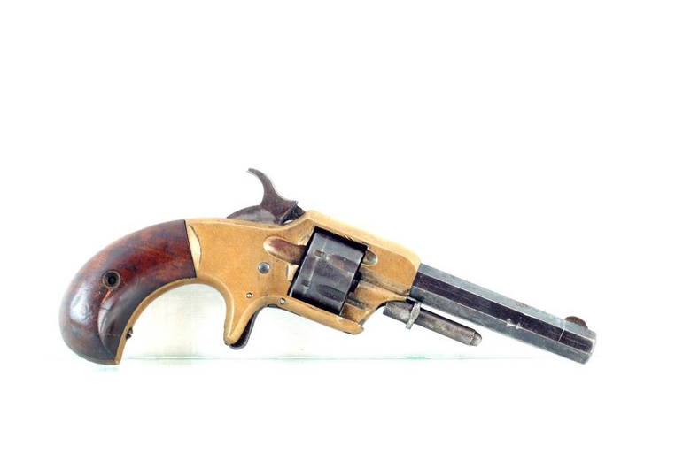 Whitney Brass Frame 22 Caliber Revolver. 7 Shot