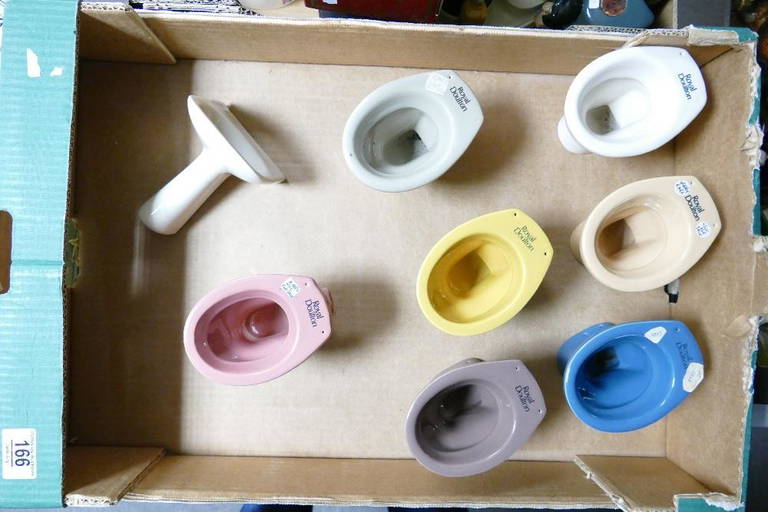 A Collection Of Royal Doulton Miniature Toilets: