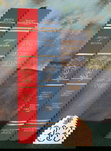 Three Rowland & Ward Big Game Hunting Record Books