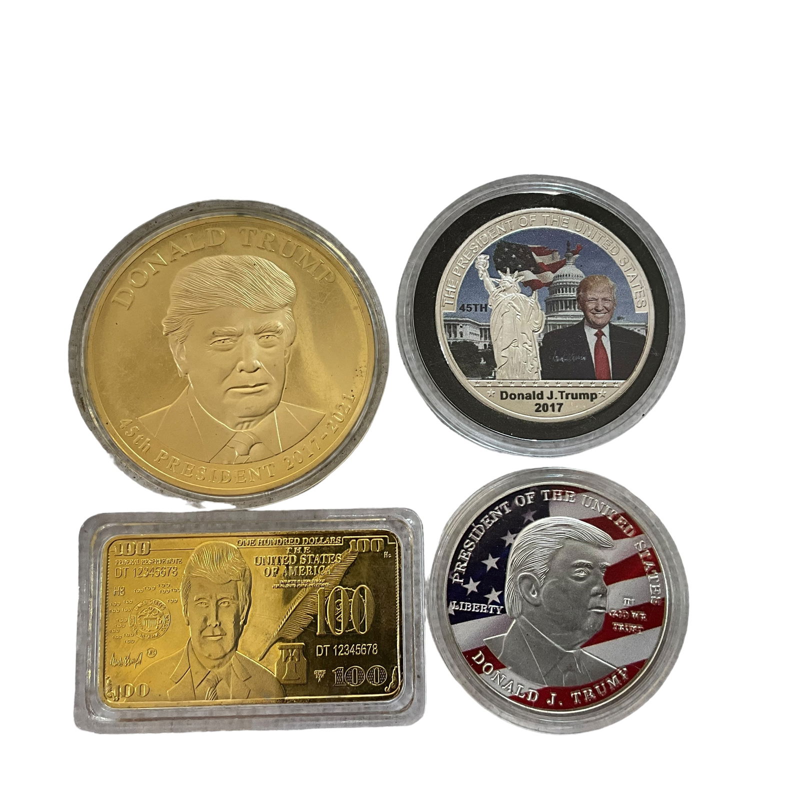 Two Donald J. Trump 24k Gold Plated Collectors $100