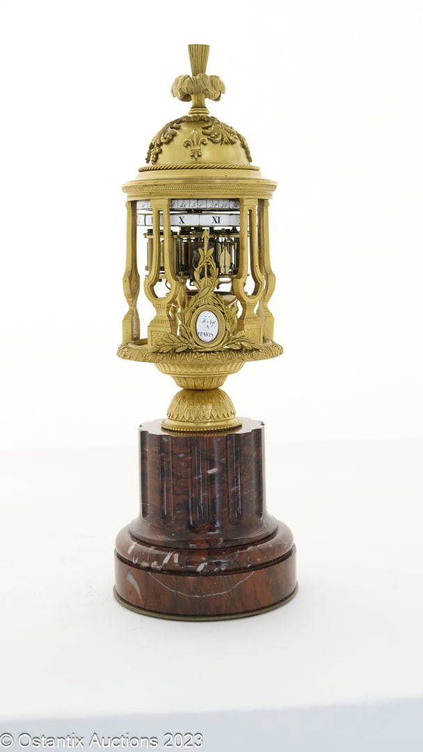 Neoclassical Clock With Rotating Dials Auction