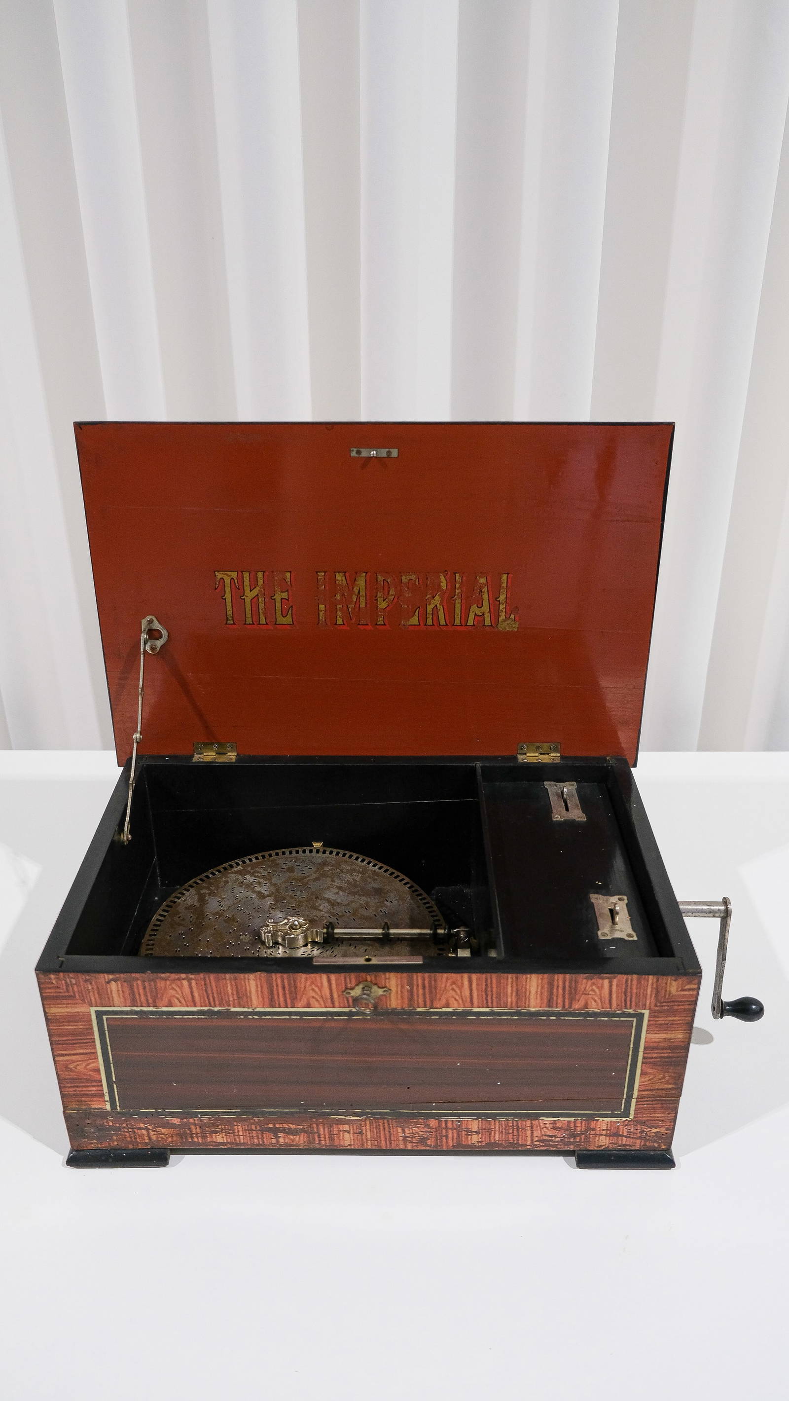An Antique Automatic Music Box With Disc By The Imperial Auction