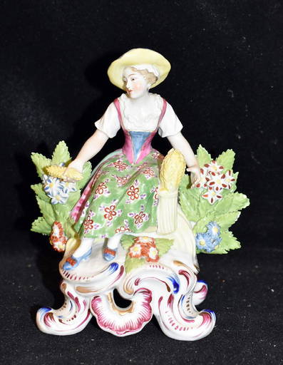 Chelsea Porcelain Figure Of Seated Woman