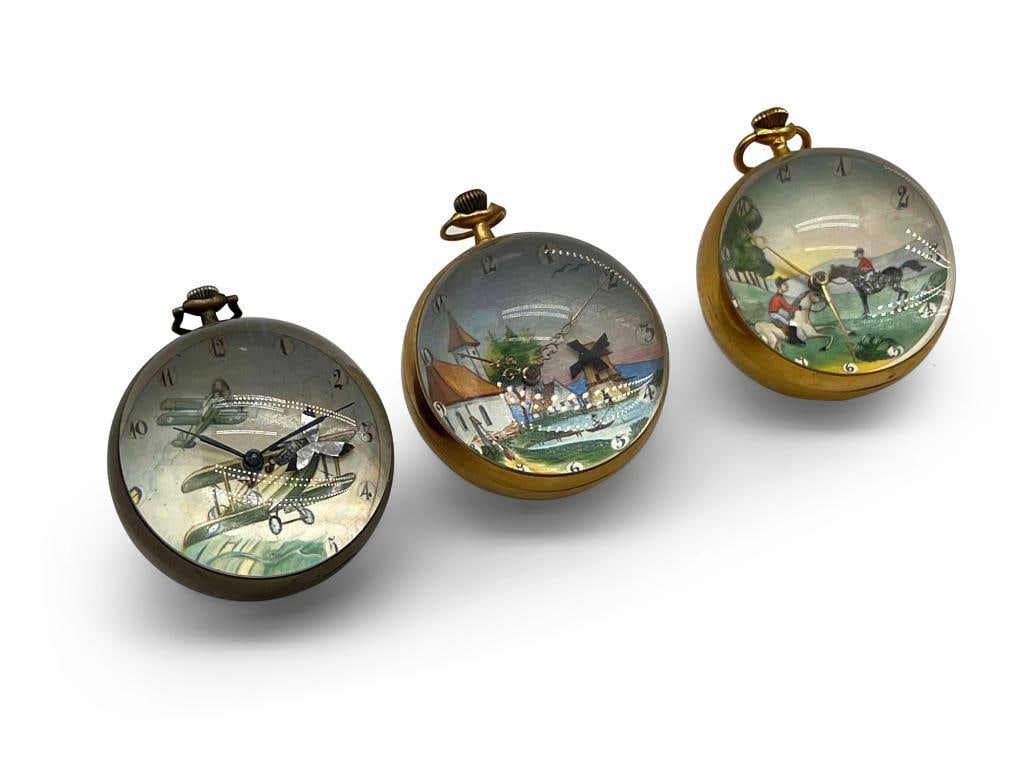 Three Paperweight Ball Clocks Auction