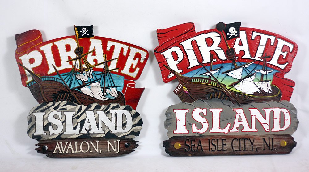 Two Pirate Island Signs
