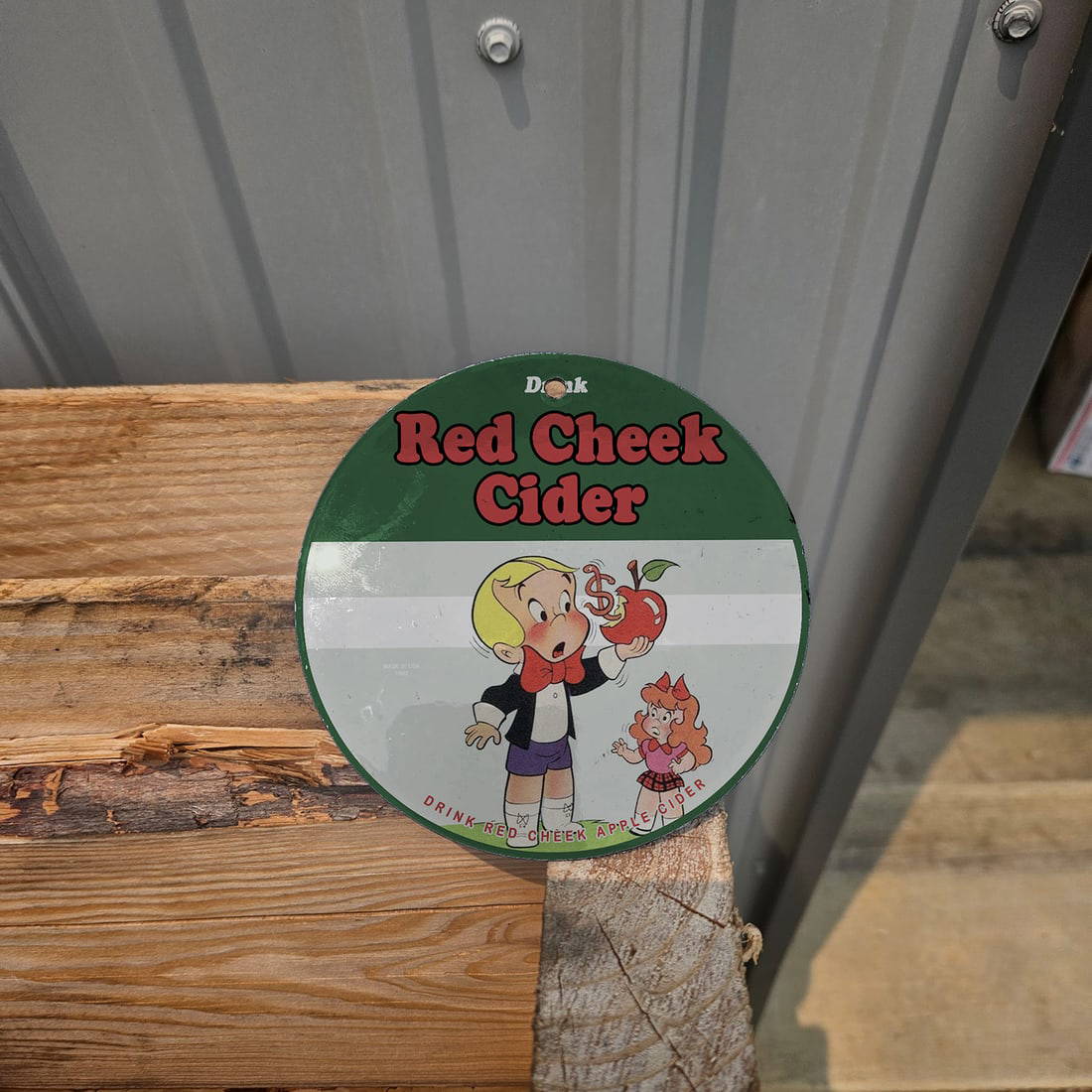 1962 Drink Red Cheek Cider 4.5-inch Porcelain Sign Auction
