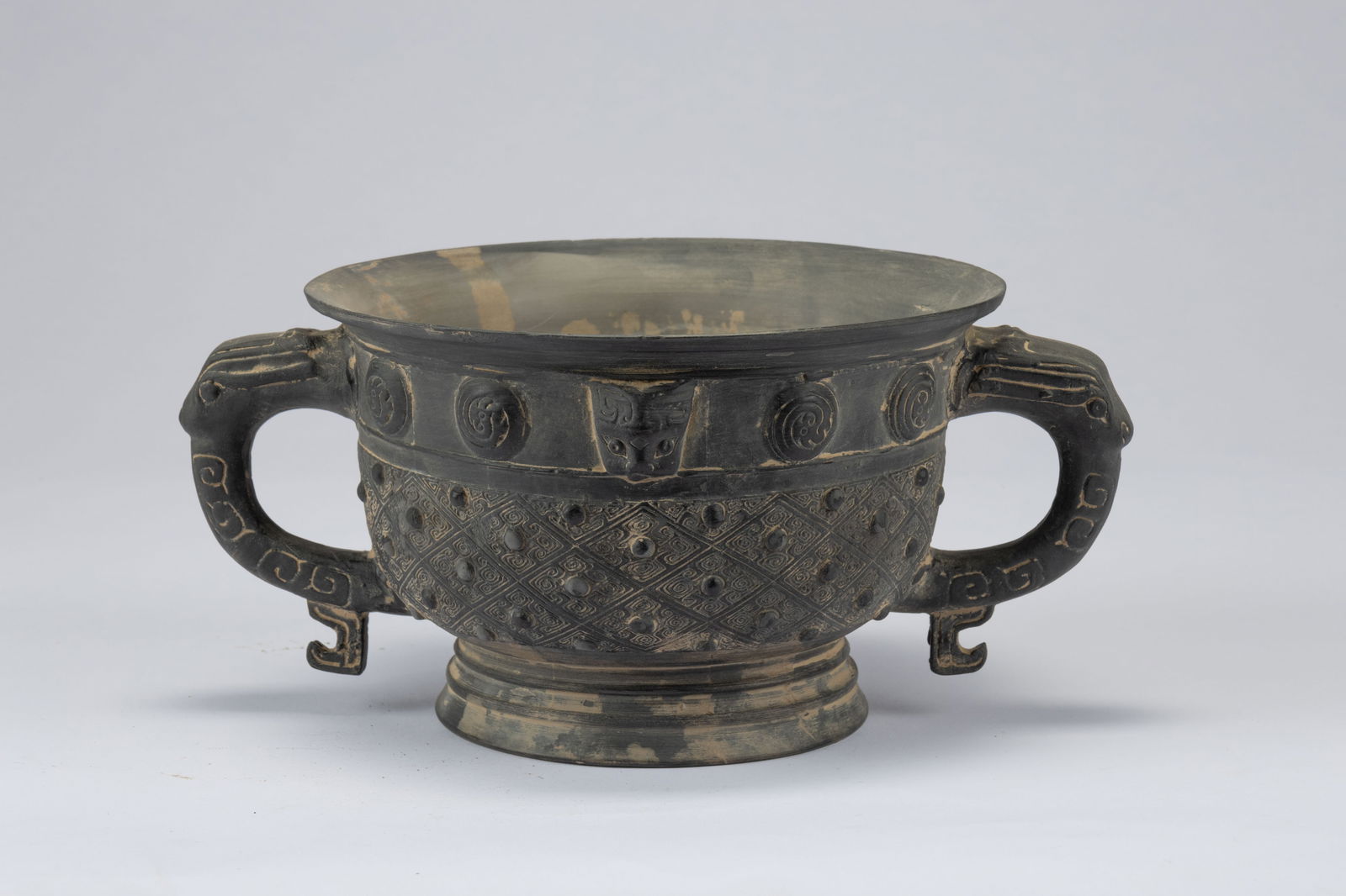 Han Dynasty Black Pottery Gui Type Stove Auction