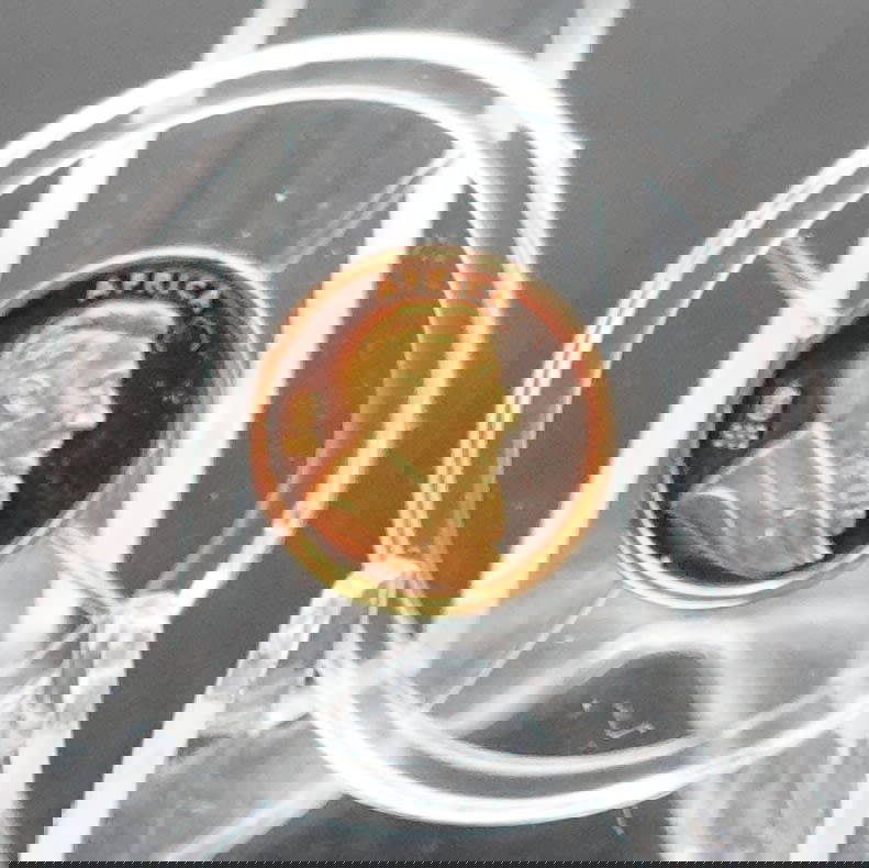 Worlds Smallest Gold Coin Auction