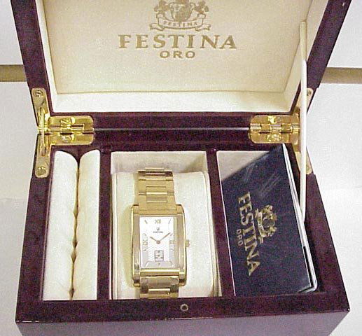 3197: Man's Festina Oro Watch 18k Yellow Gold