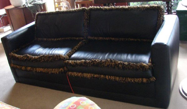 144: Black Leather Hide-a-Bed Couch Sofa Fringe Trim