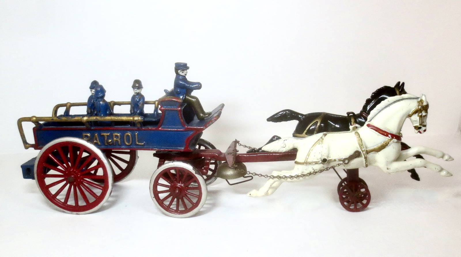 Dent Hardware Cast Iron Police Patrol Toy Auction