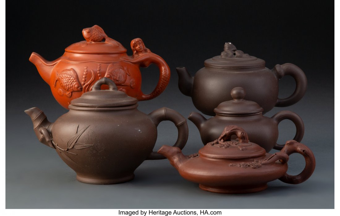 A Group Of Five Yixing Pottery Teapots Marks To