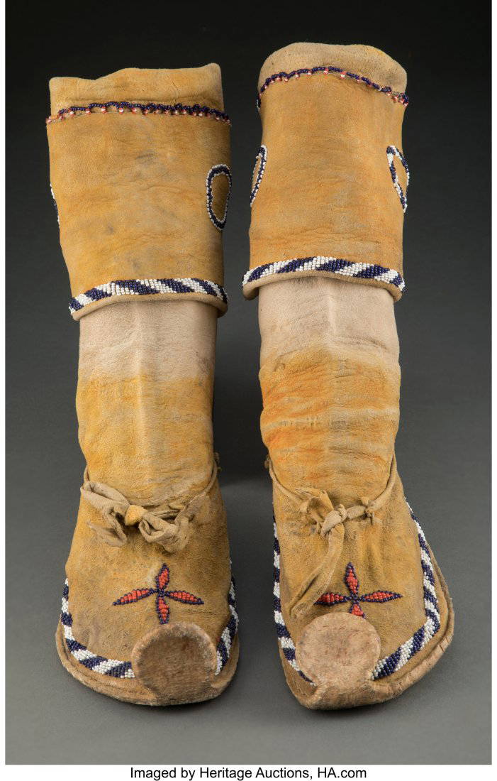 70256: A Pair Of Apache Beaded Hide Boot Moccasins C. Auction