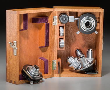 A Cased Leitz Wetzlar Phase Contrast Kit With He