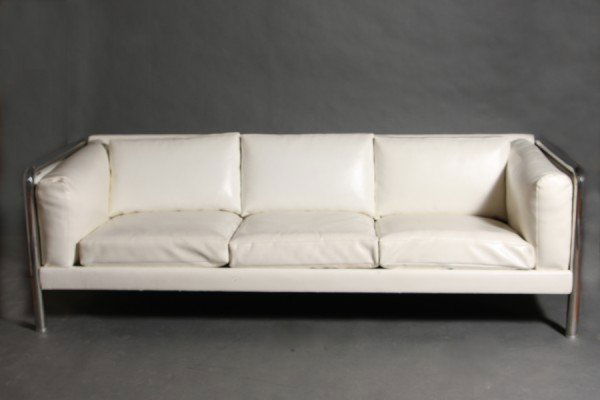 37: Custom White Naugahyde, Polished Stainless Sofa wit