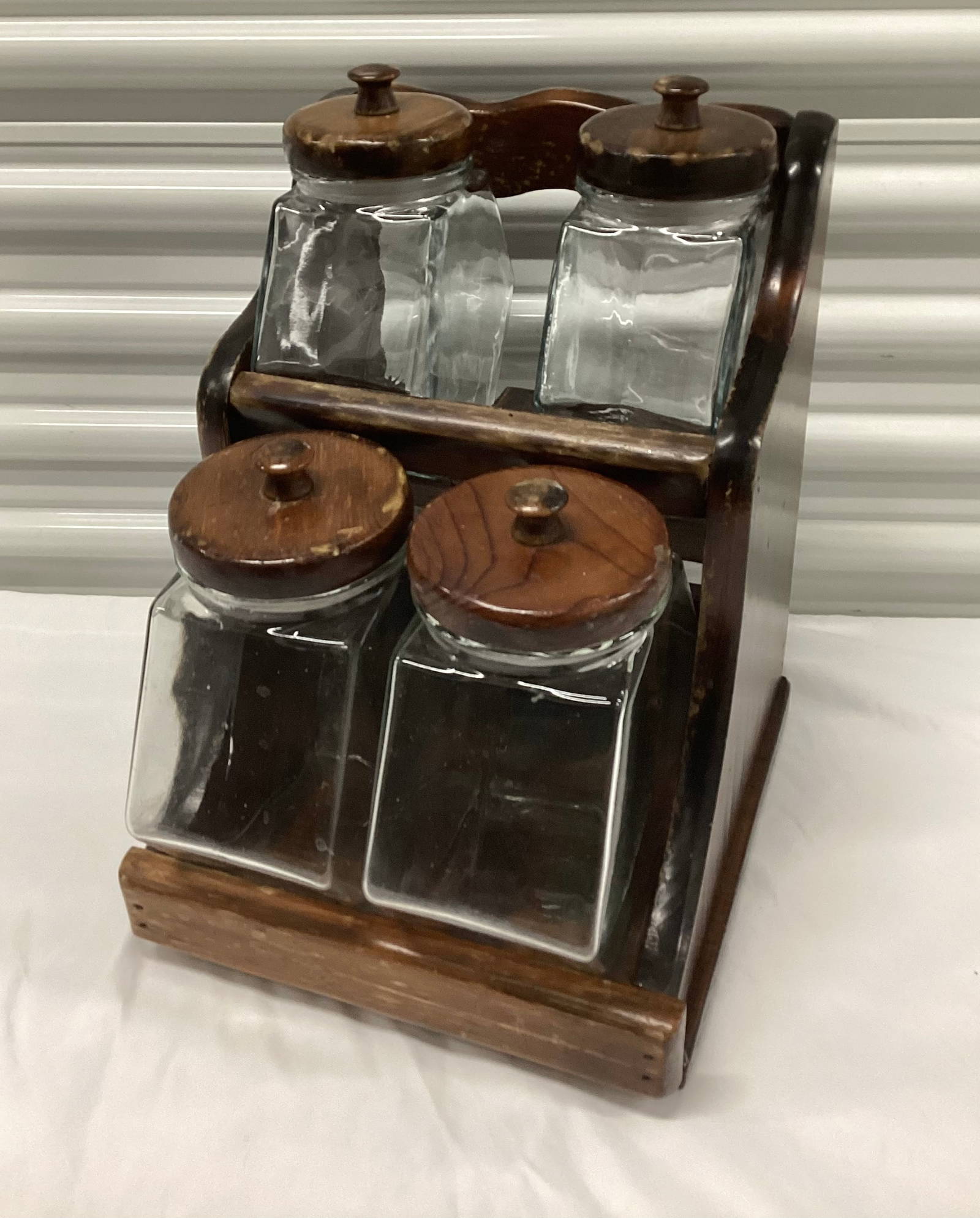 Slanted Glass Canister Set In Wood Shelf Auction