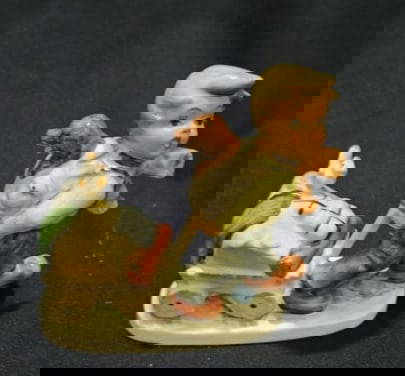 Friedel Porcelain Figurine 'boy With Wagon' Auction