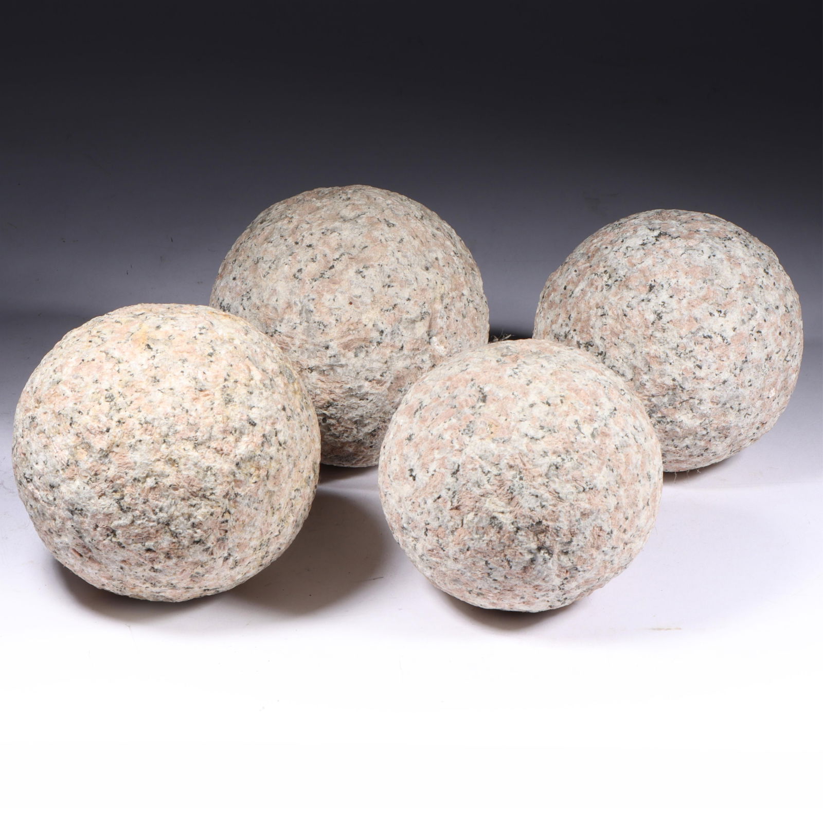 Four Maine Naturally Tumbled Granite Balls. 4 1/4"diam. (one) Auction