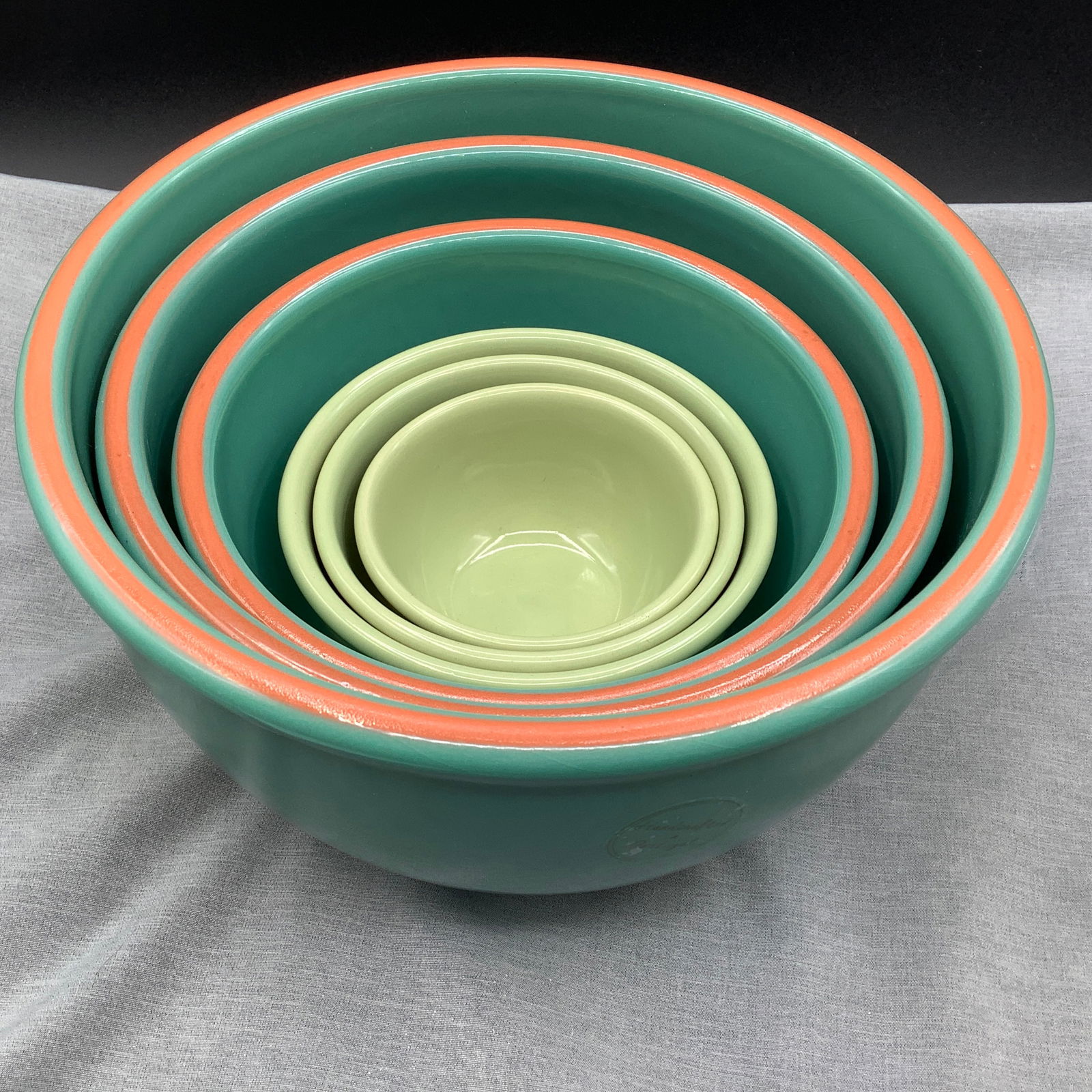2 Sets Of Graduated Nesting Bowls Auction