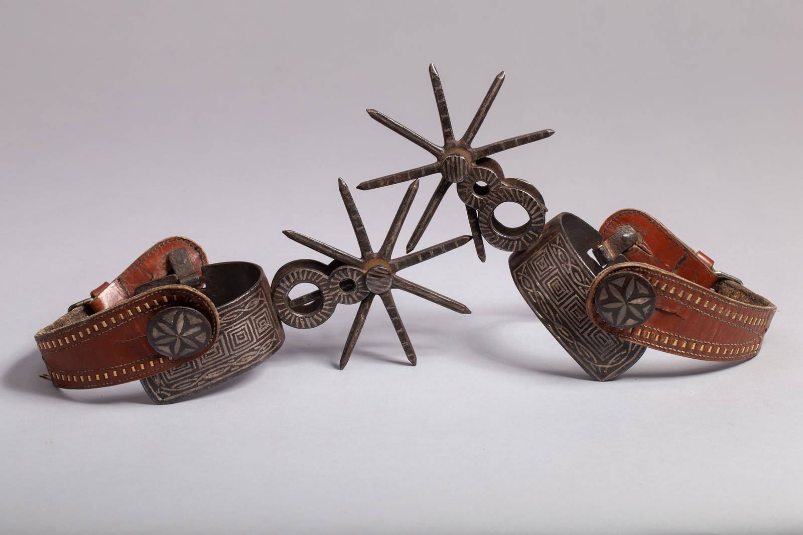 Mexican Spurs With Figure Eight Shank Design And Large Spiked Rowels Auction