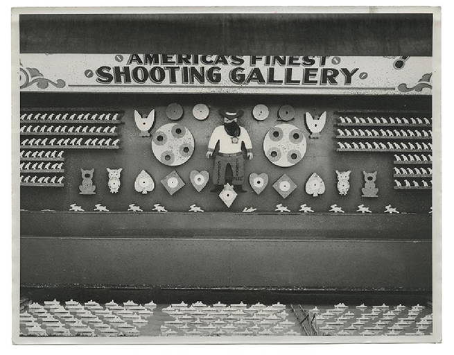 Vintage “sneaky Pete” Shooting Gallery Photograph.