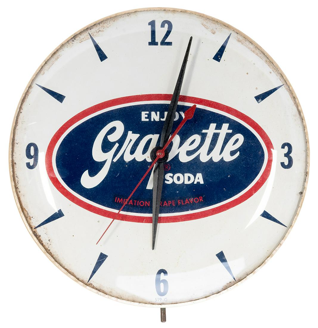 Grapette Soda Electric Advertising Clock. 1950s. Blue