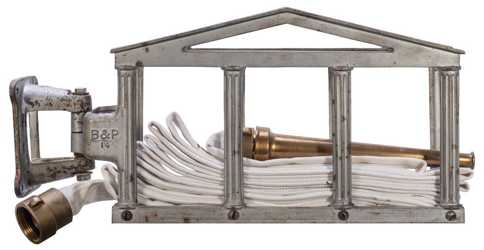 Cast iron wall-mounted fire hose rack. [N.p., n.d.]. “B & P 14” on rack ...