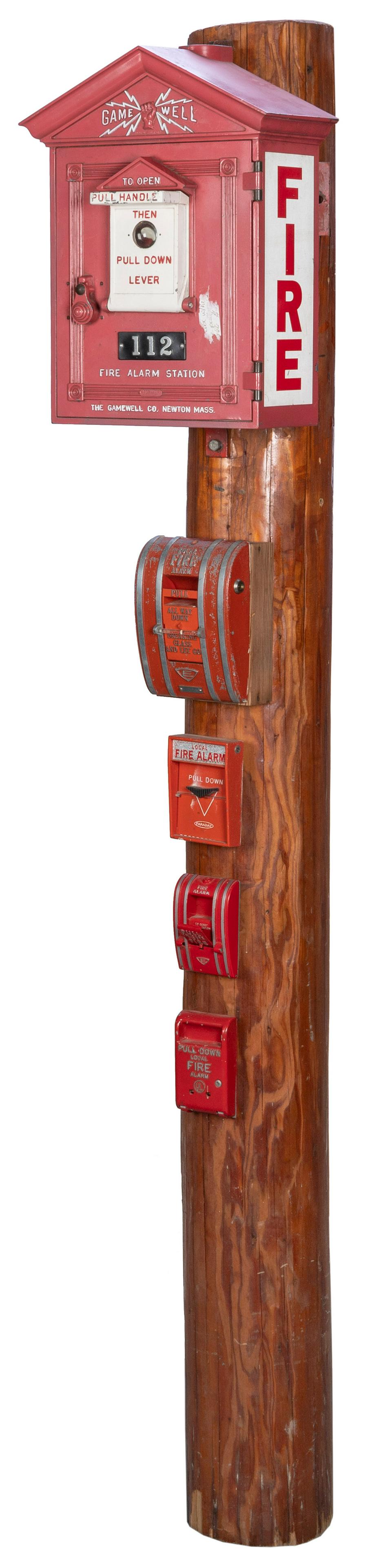 Group of 4 “Pull-Down” fire alarms and a fire alarm box, all mounted ...
