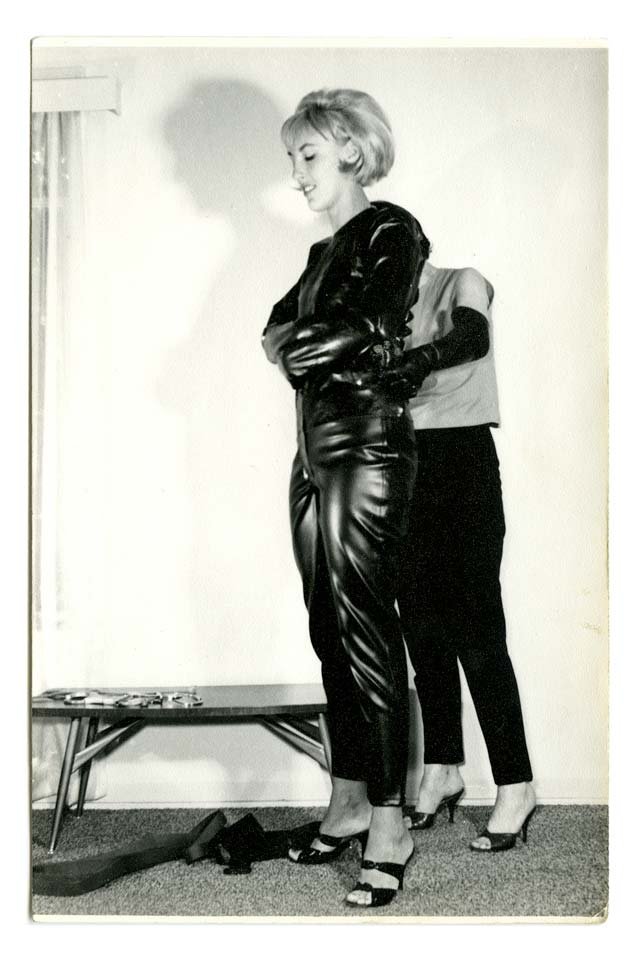 Group of Eleven Photos of a Female Escape Artist. N.p.,