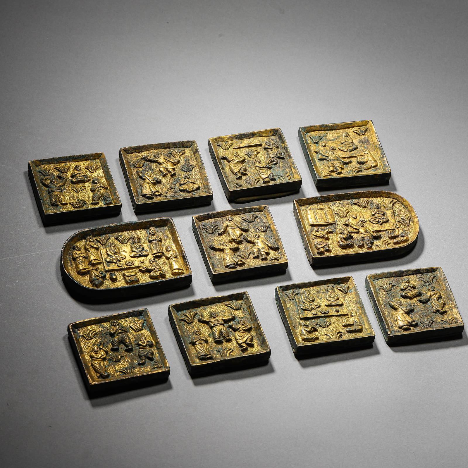 A Set Of Chinese Gilt-bronze Straps With Jade Insets. Auction