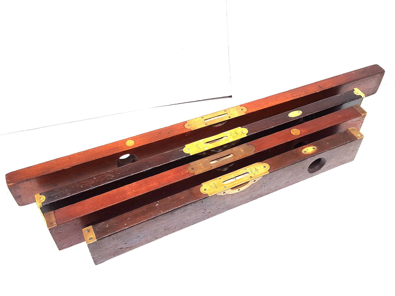 Four Stratton Bros. Levels Auction